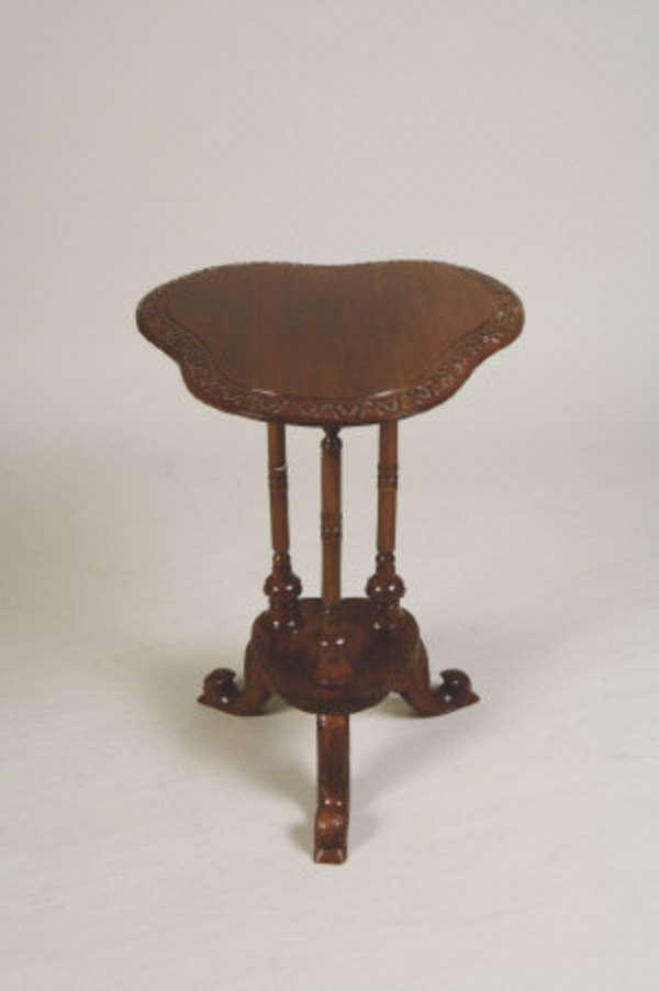 LOT:466 | An Edwardian mahogany occasional table of trefoil form ...